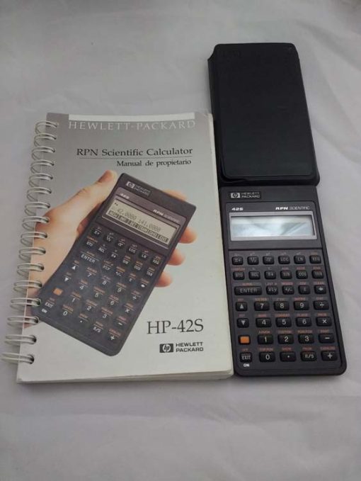 Calculator HP 32SII RPN with the manual and case # 397 – Casio 880